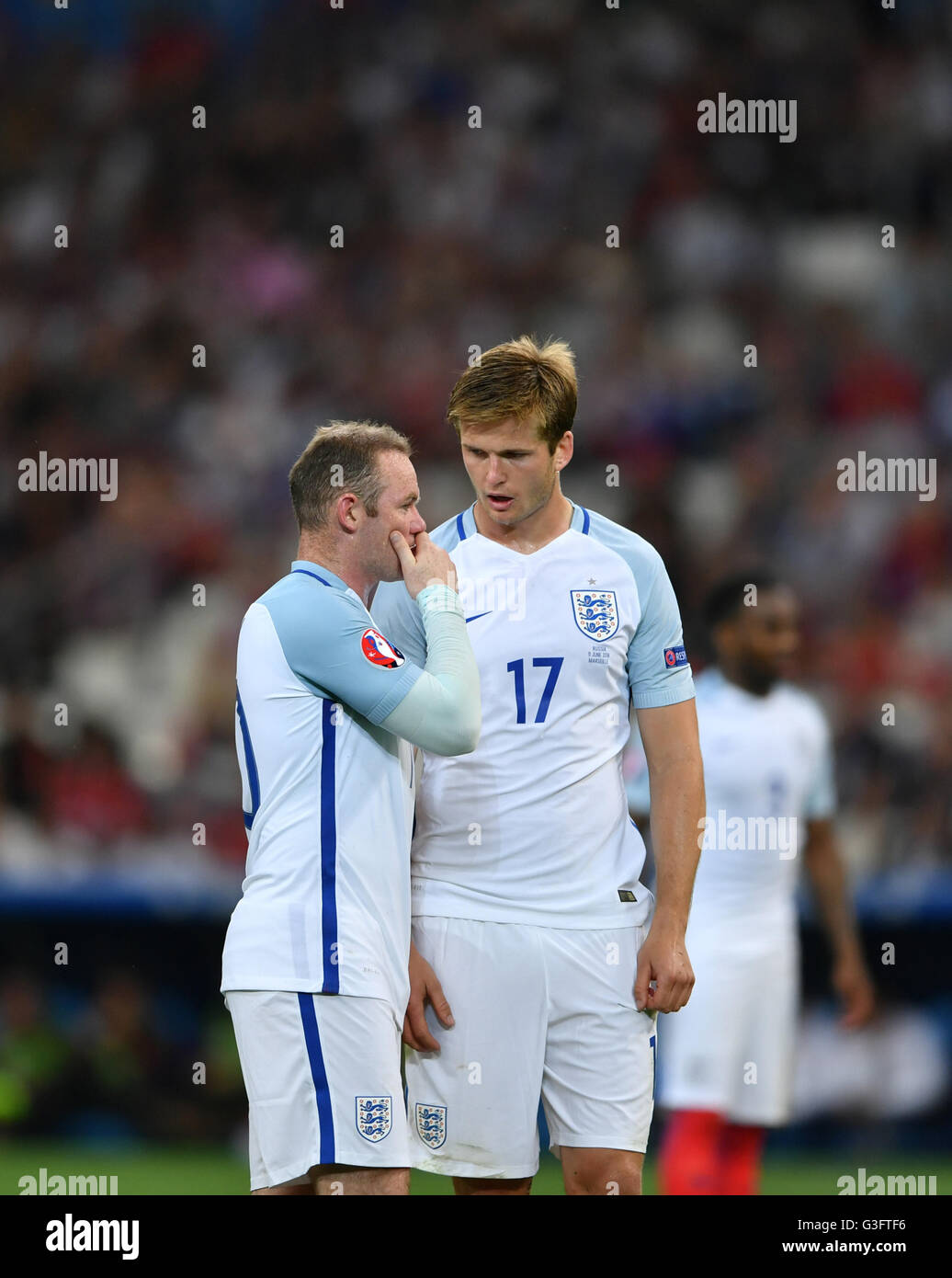 Marseille, France. 11th June, 2016. Wayne Rooney (L) of England talks ...