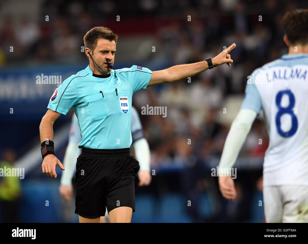 Referee Nicola Rizzoli (L) from Italy gestures during the UEFA Euro ...