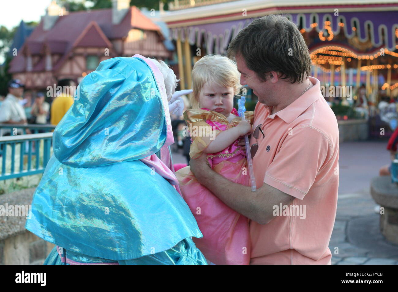 Grumpy toddler, little girl, child princess meeting Cinderella's Fairy ...