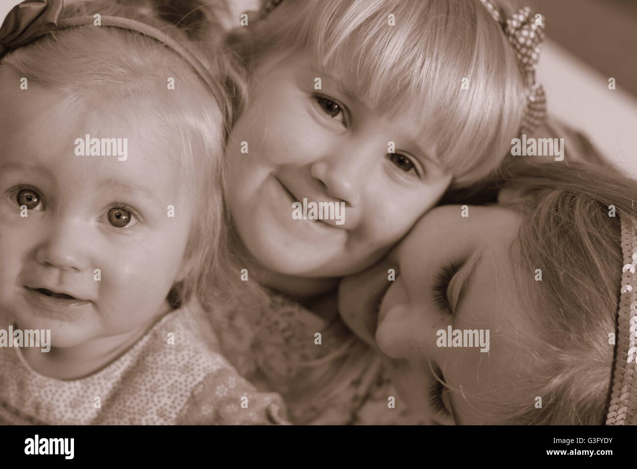 Three girls friends cuddling on hi-res stock photography and images - Alamy