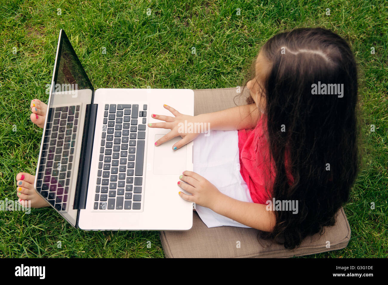 Child using computer Stock Photo - Alamy