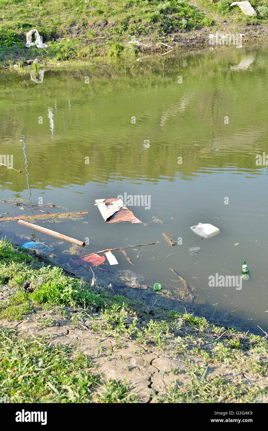 RubbishRubbish, waste floating in polluted pond., waste floating in ...