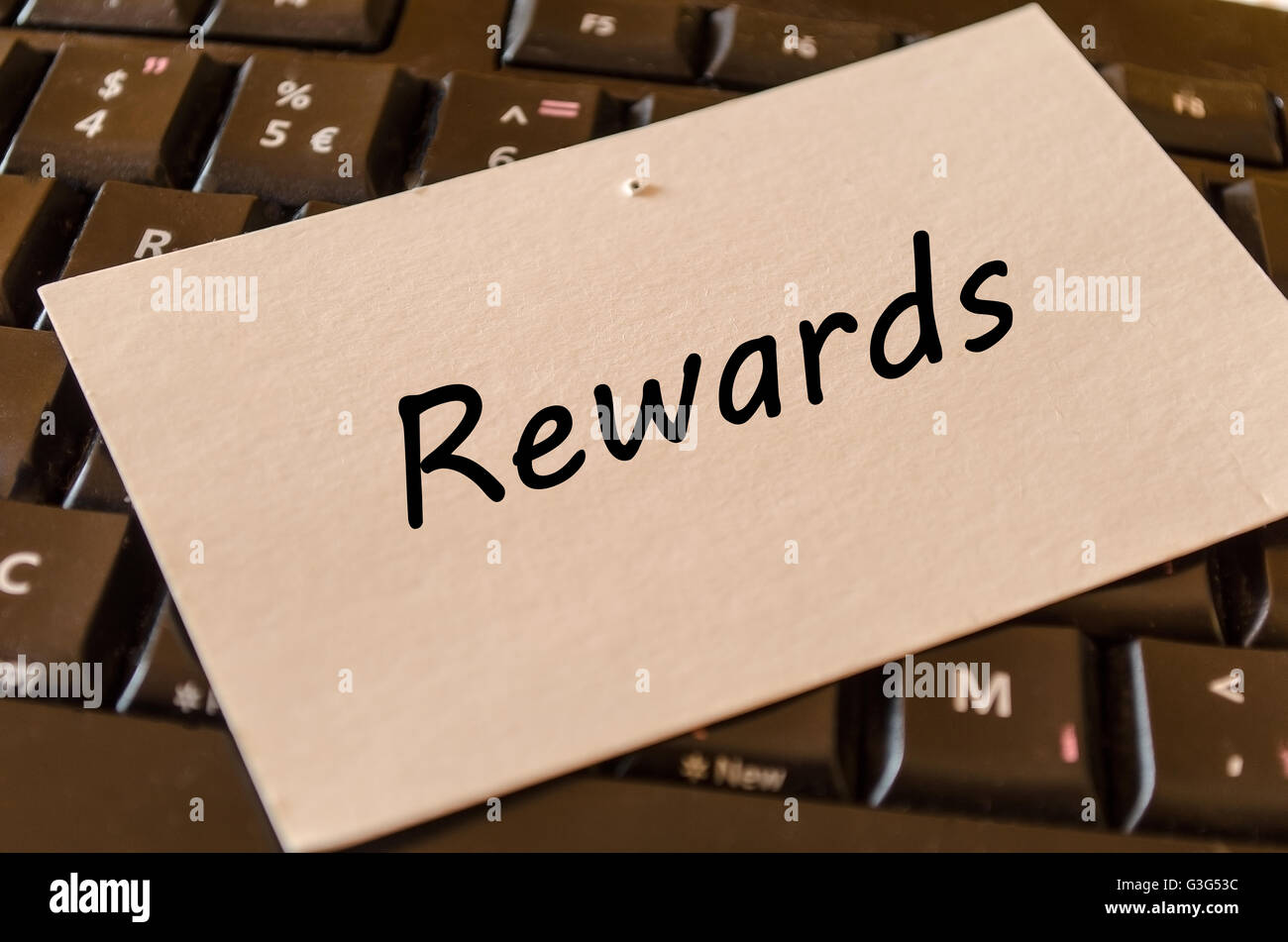 Rewards concept on black keyboard background Stock Photo - Alamy