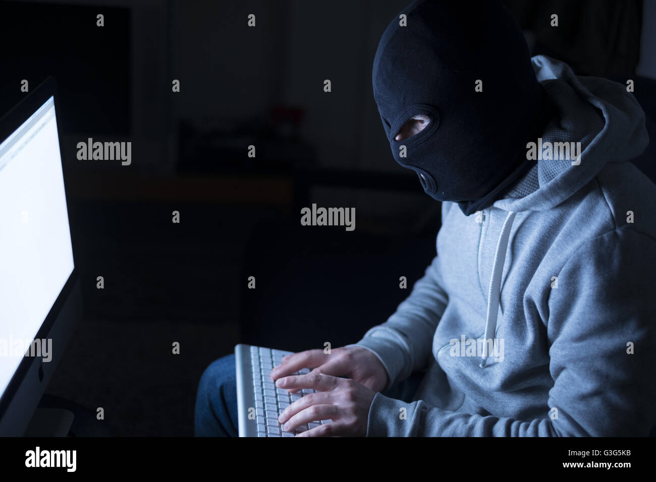 Man computer hacker binary hi-res stock photography and images - Alamy