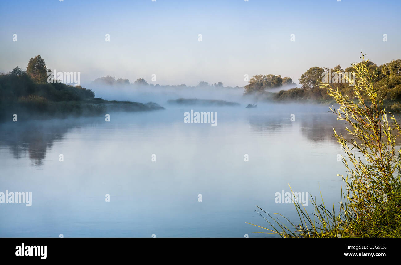 river landscape in early morning with mystery fog Stock Photo - Alamy