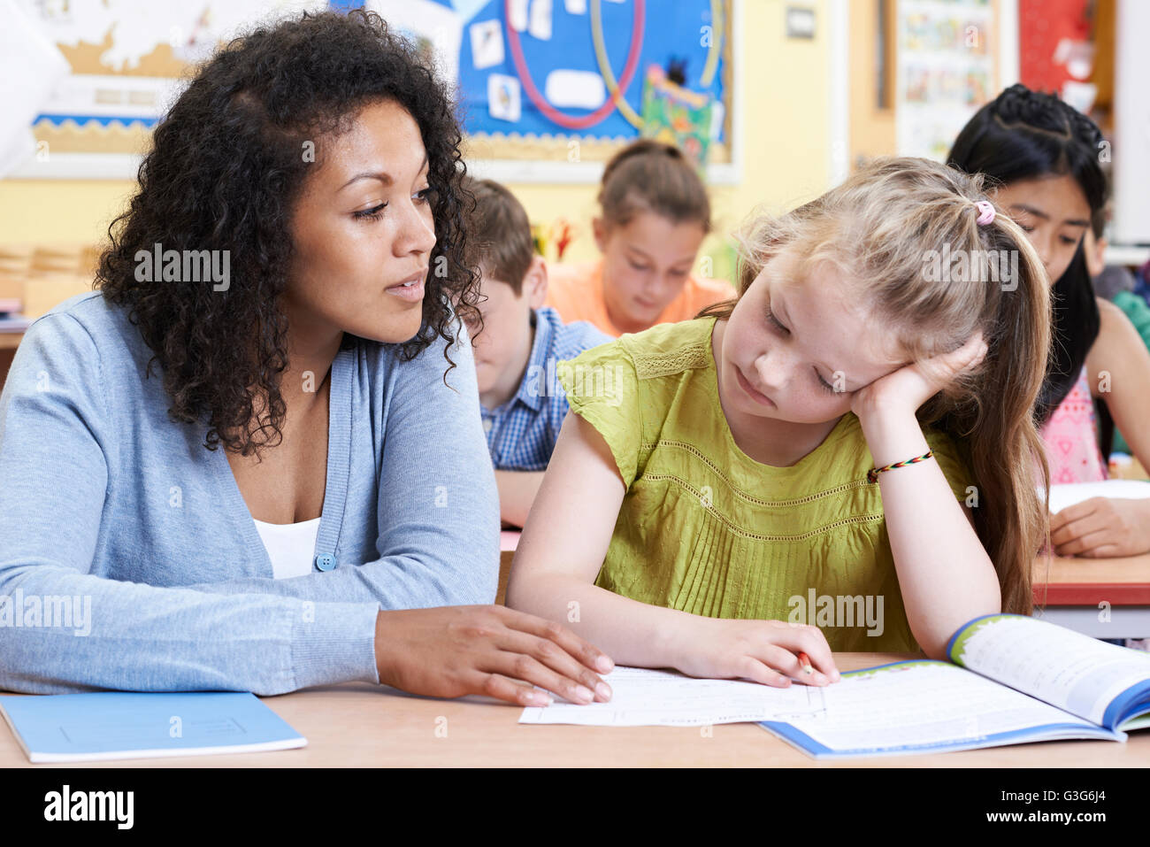 Filipino women bored at desk hi-res stock photography and images - Alamy