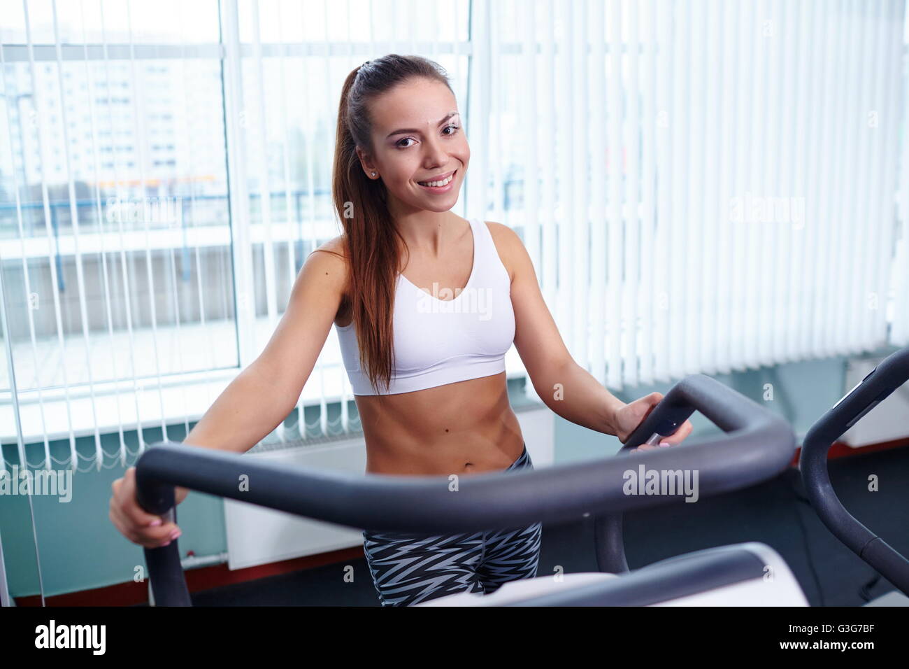 pretty girl training at the gym Stock Photo - Alamy