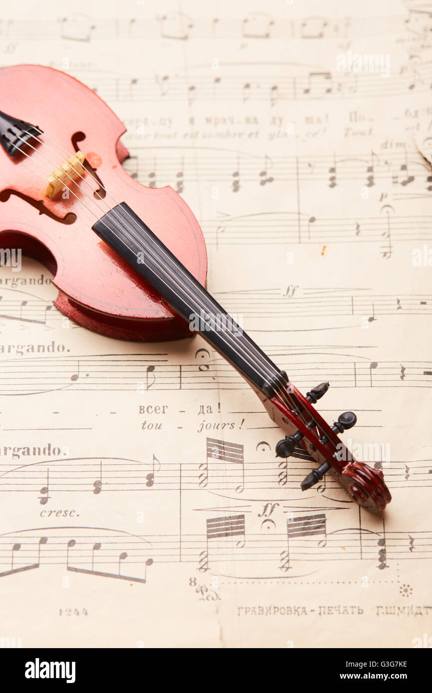 violoncello on of notes background Stock Photo - Alamy