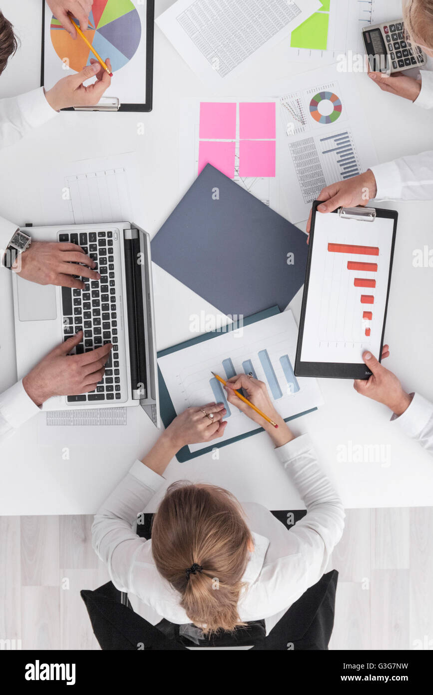 Team discussing financial charts hi-res stock photography and images ...
