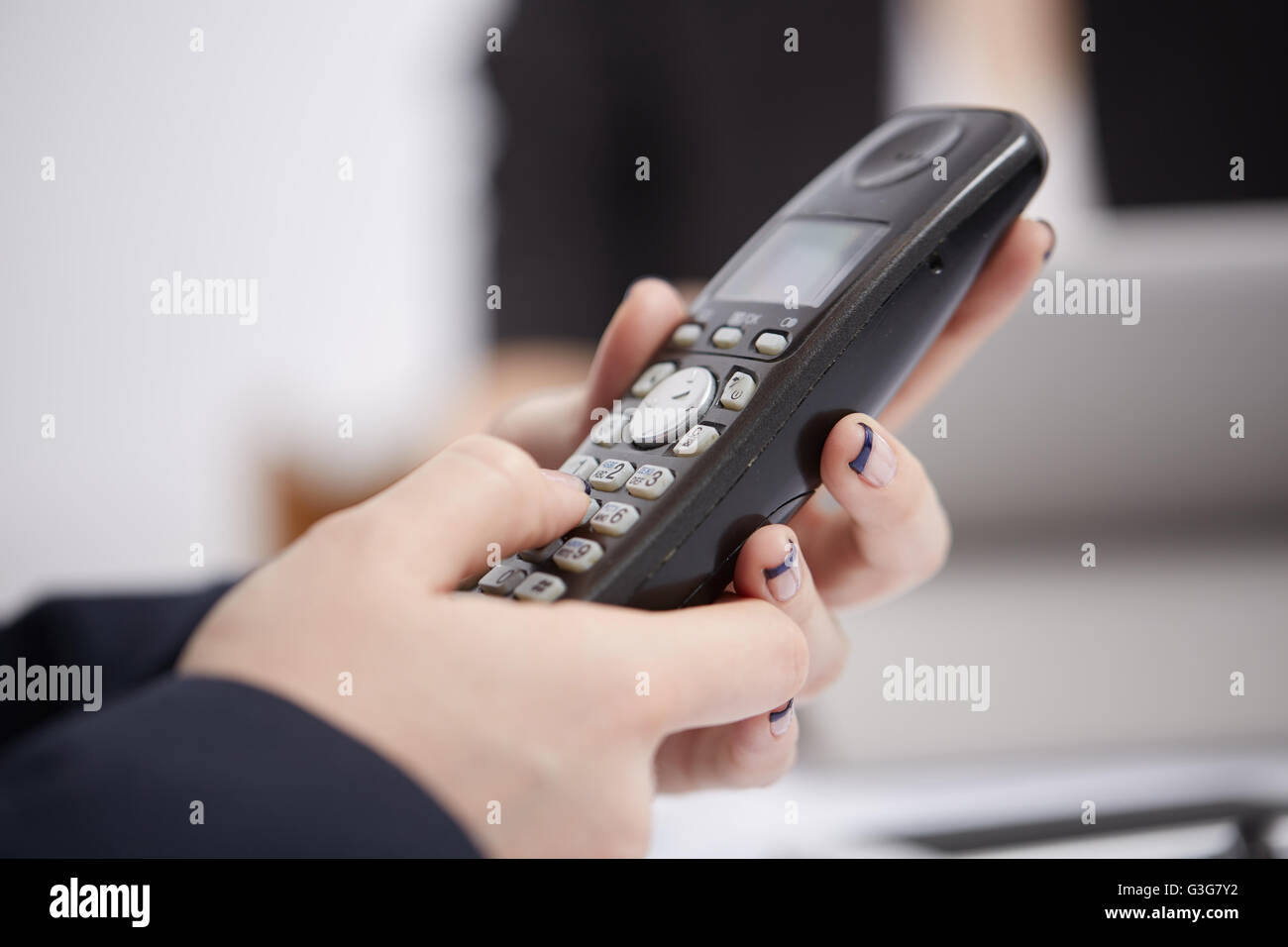 Radio phone in female hands Stock Photo - Alamy