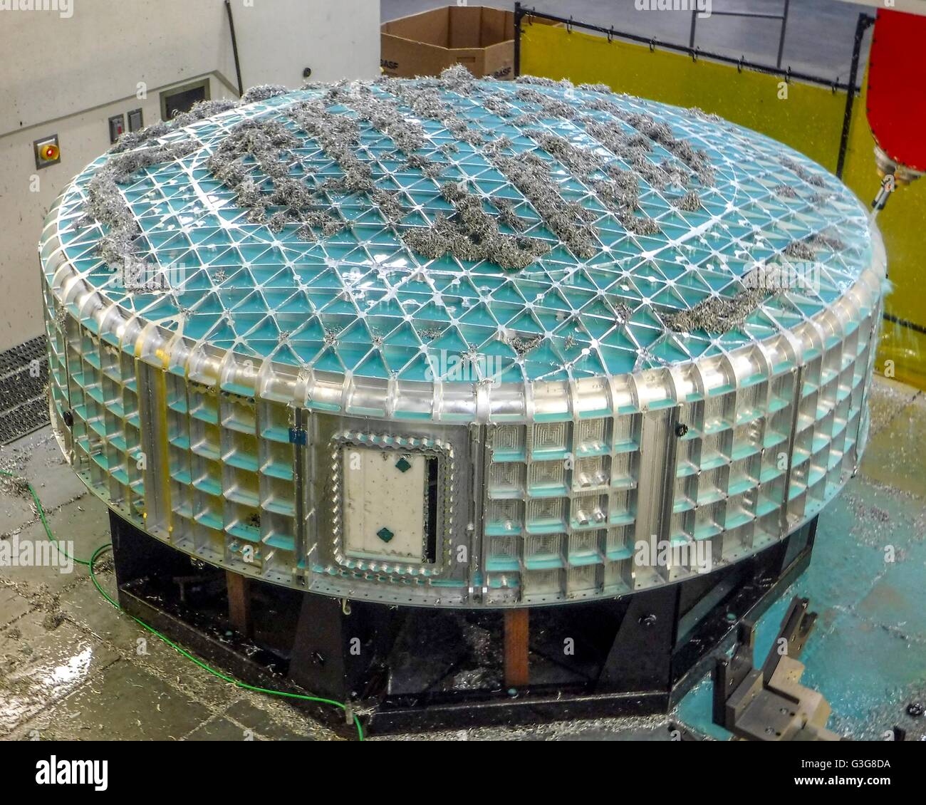 Aluminum burr waste is scattered over the first of four lower domes for ...