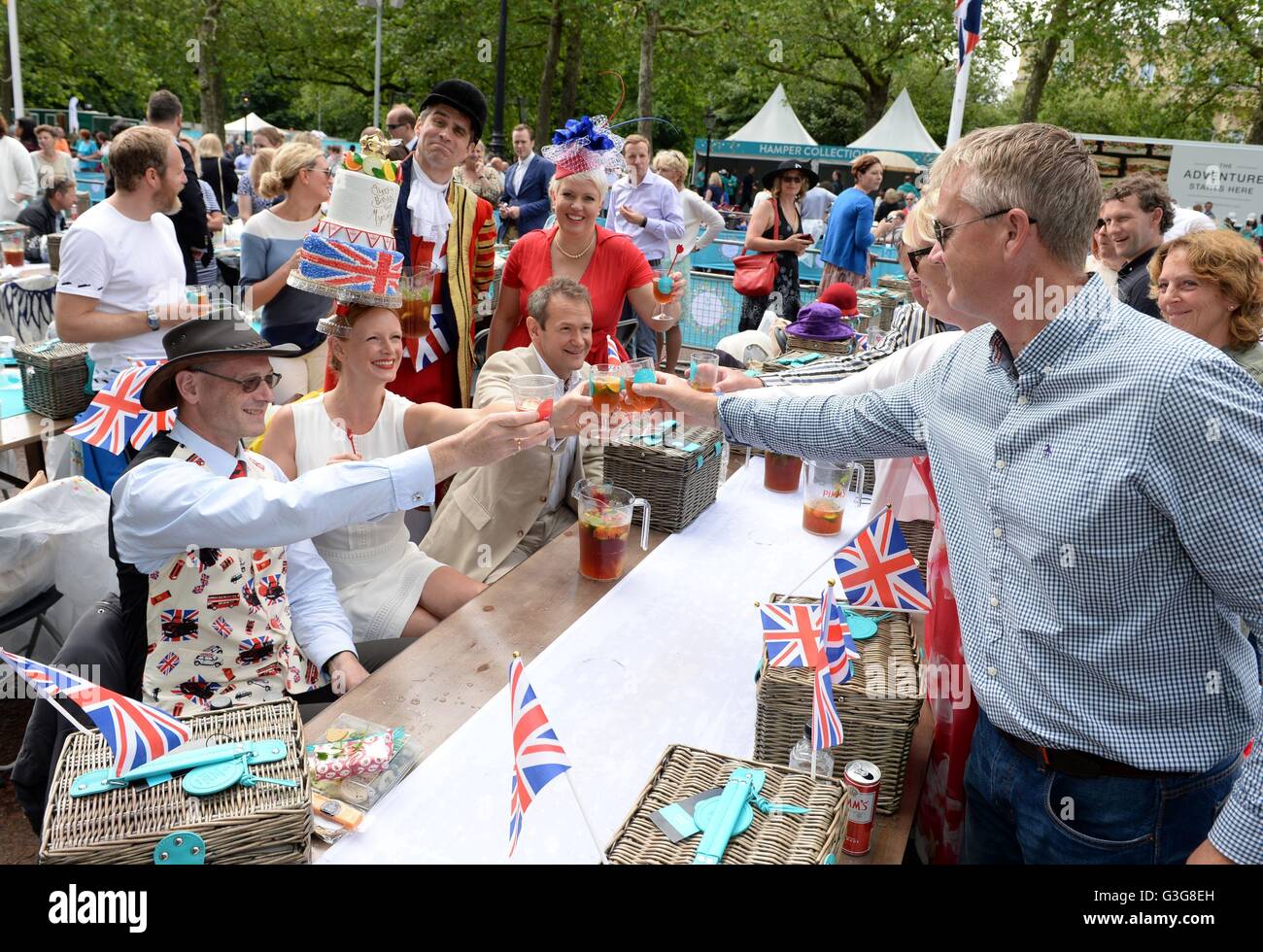 EDITORIAL USE ONLY Pimm's Footman Ben Watson, Olivia Inge and ...