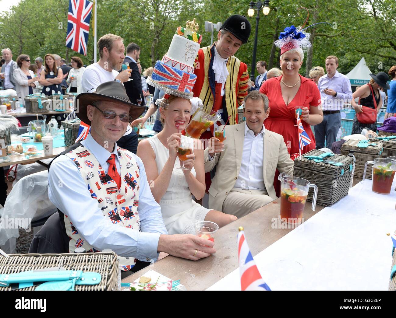 EDITORIAL USE ONLY Pimm's Footman Ben Watson, Olivia Inge and ...