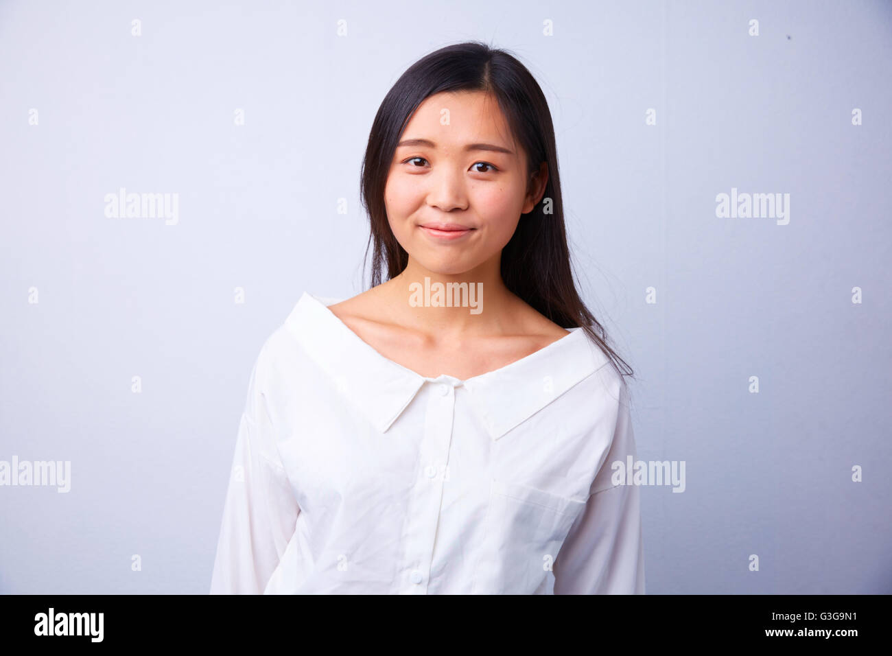 smiling Chinese woman in white Stock Photo - Alamy