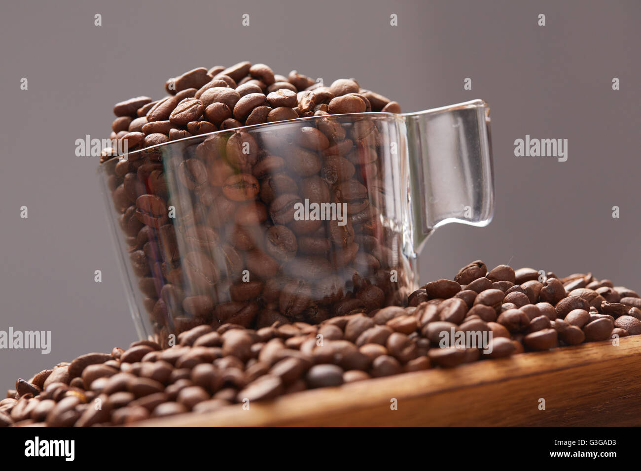 coffee beans in cup in the tray Stock Photo - Alamy
