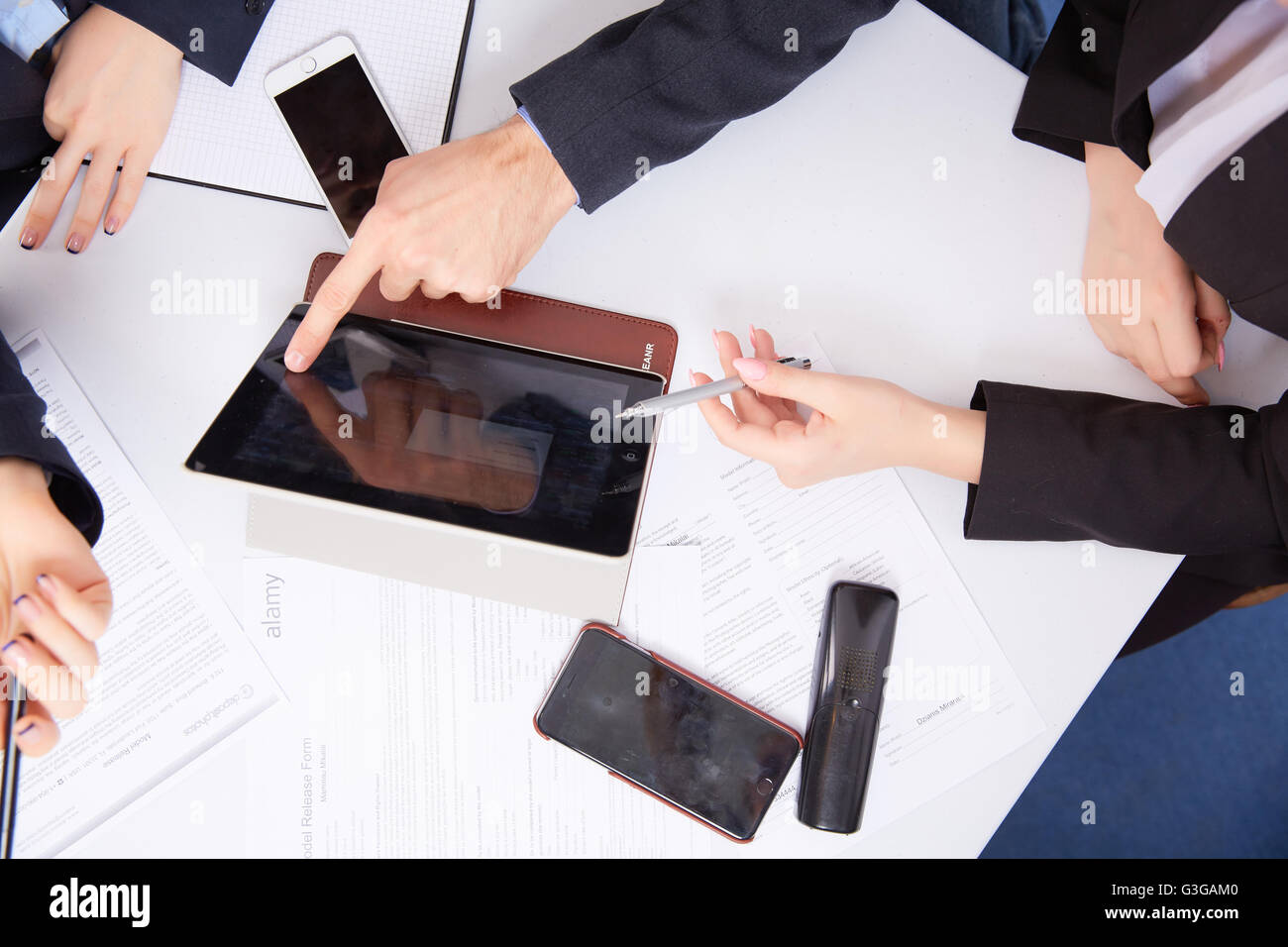 devices on the table businessmen Stock Photo - Alamy