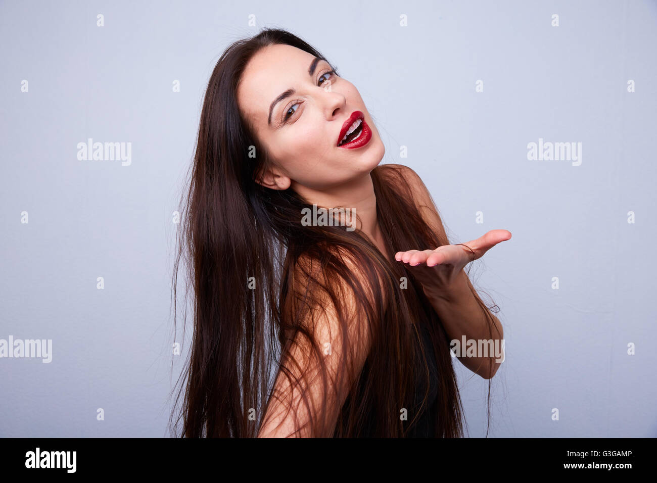beautiful girl sends an air kiss Stock Photo - Alamy