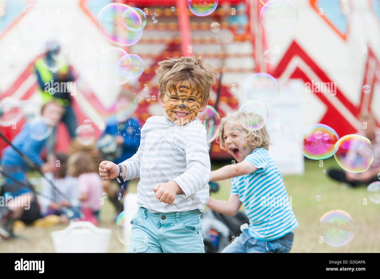 Harry Everard from the Isle of Wight bursts bubbles at the Isle of ...