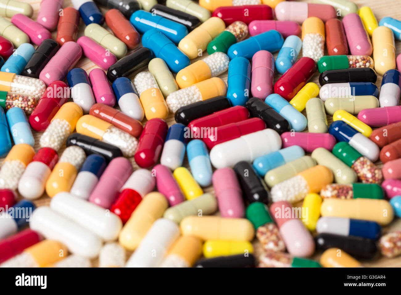 Heap of colorful drugs and pills Stock Photo - Alamy