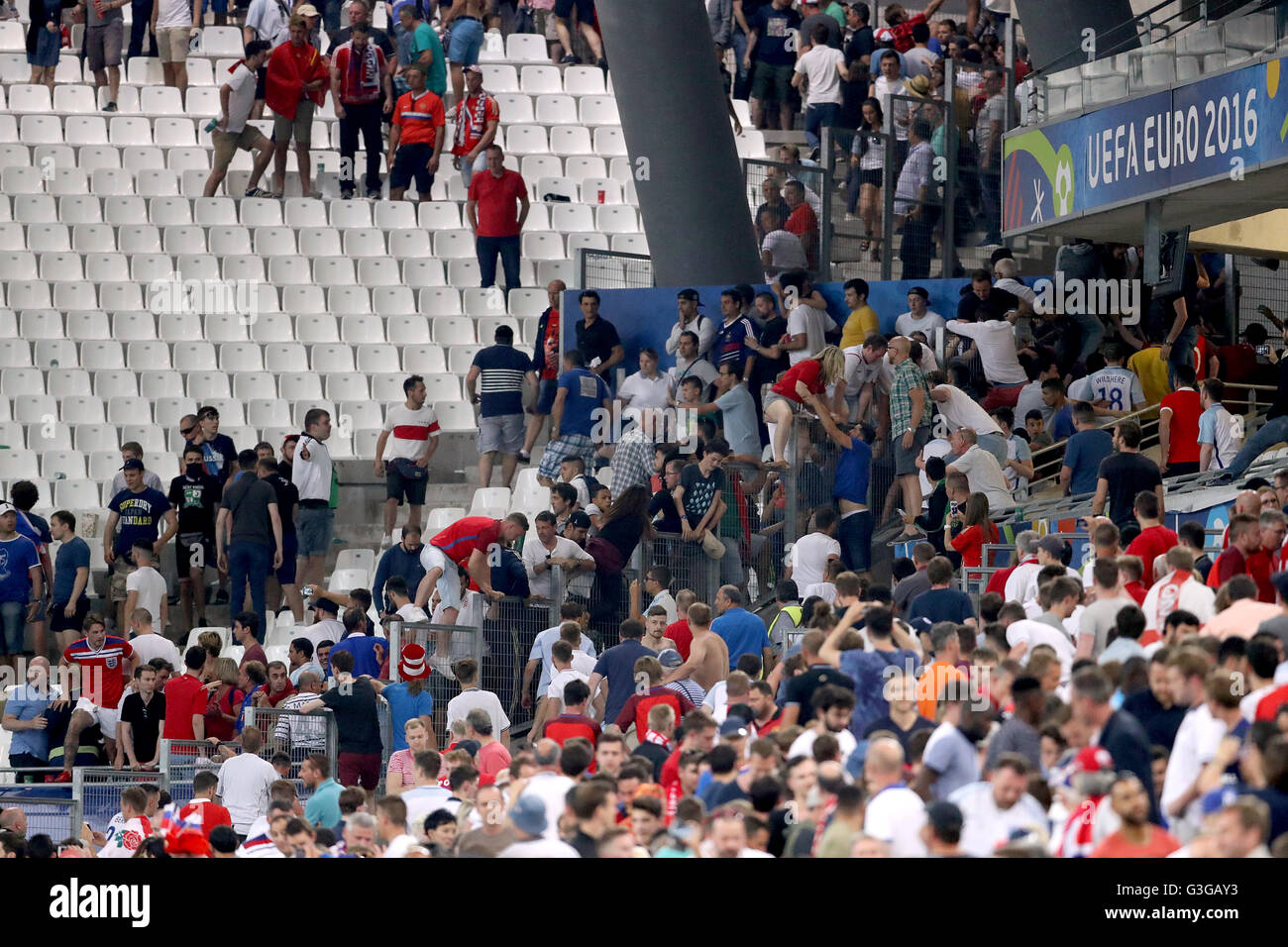 Tempers flare between rival fans in the stands during the UEFA Euro ... Tempers flare between rival fans in the stands during the UEFA Euro ...