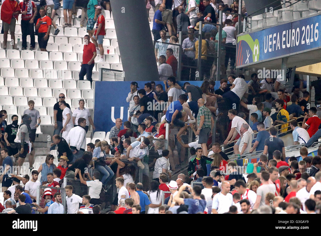 Tempers flare between rival fans in the stands during the UEFA Euro ... Tempers flare between rival fans in the stands during the UEFA Euro ...