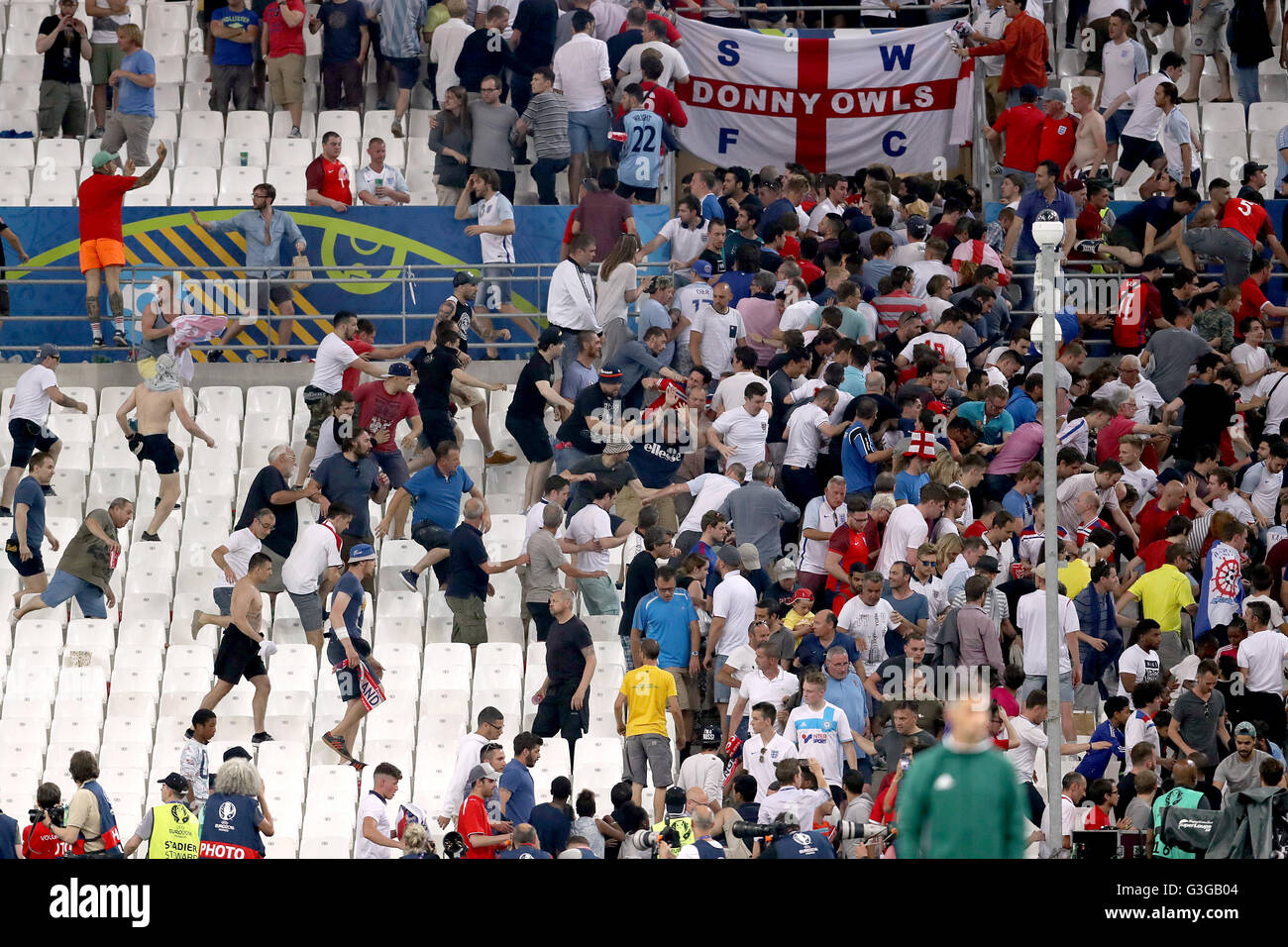 Tempers flare between rival fans in the stands during the UEFA Euro ... Tempers flare between rival fans in the stands during the UEFA Euro ...
