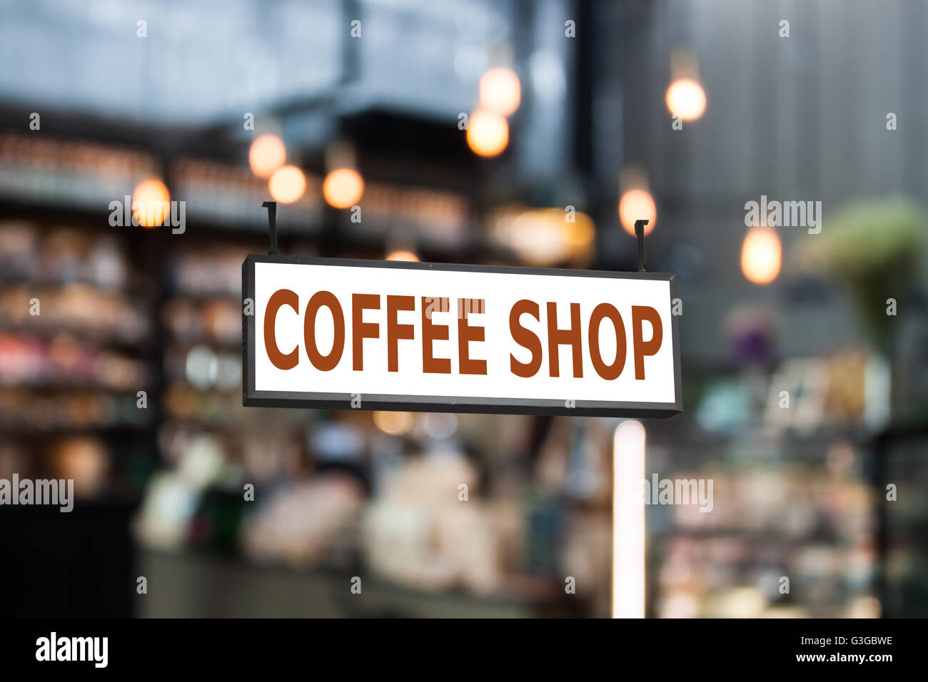 Coffee shop signboard with coffee shop blurred background with bokeh ...