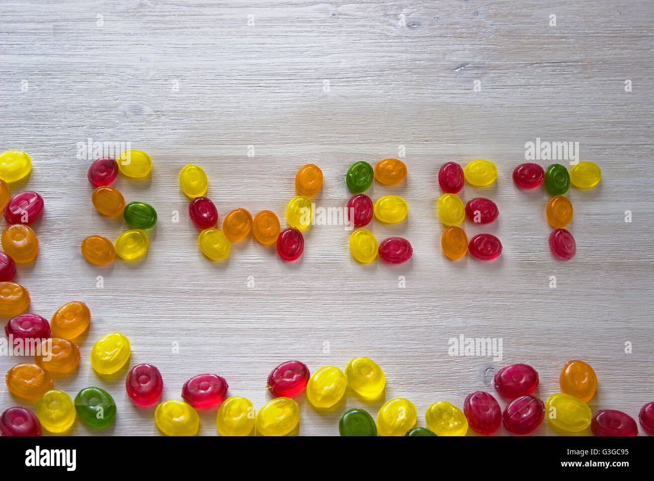 sweet word made from candies Stock Photo - Alamy