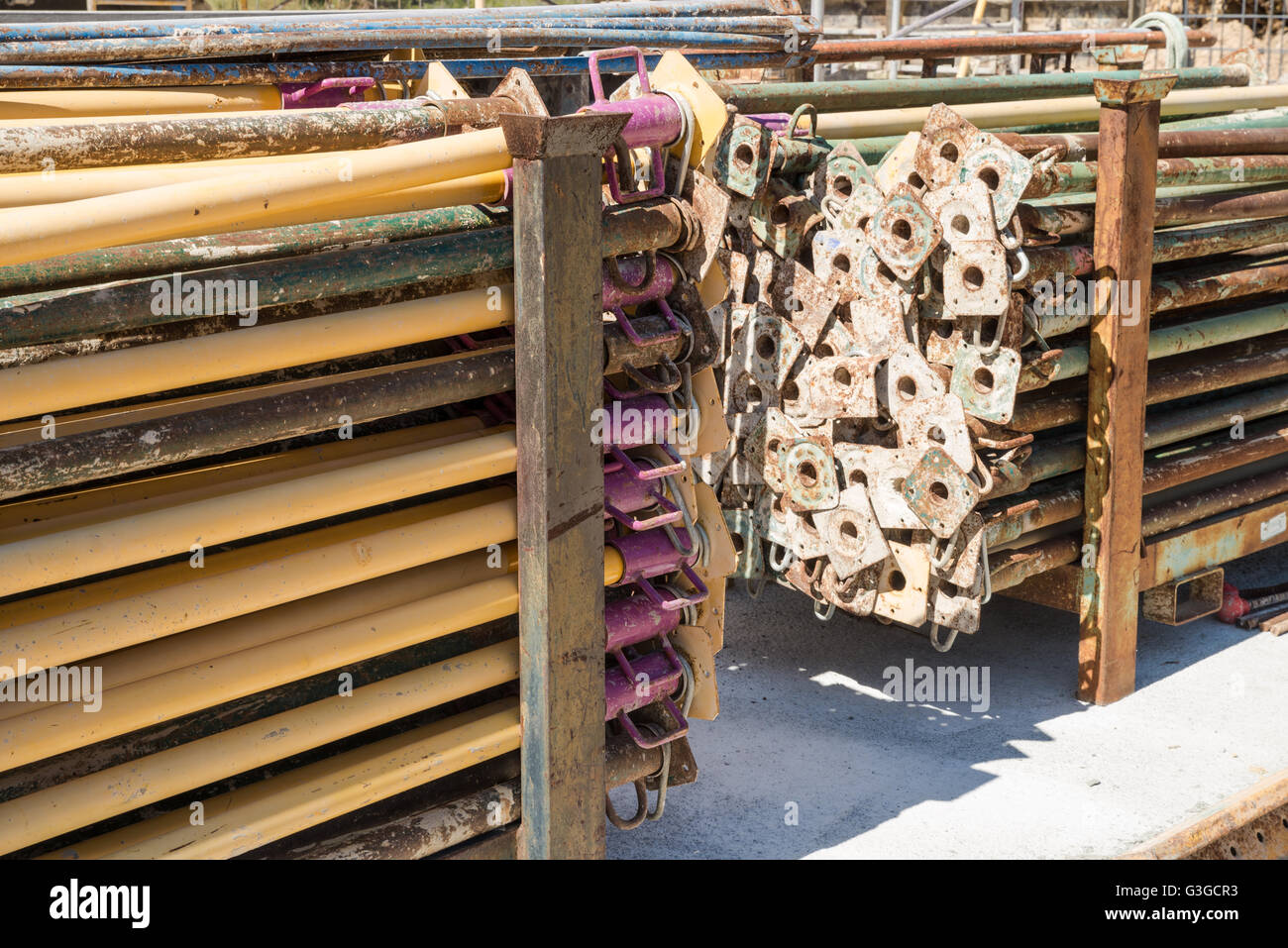 Used props stacked on a building site Stock Photo - Alamy