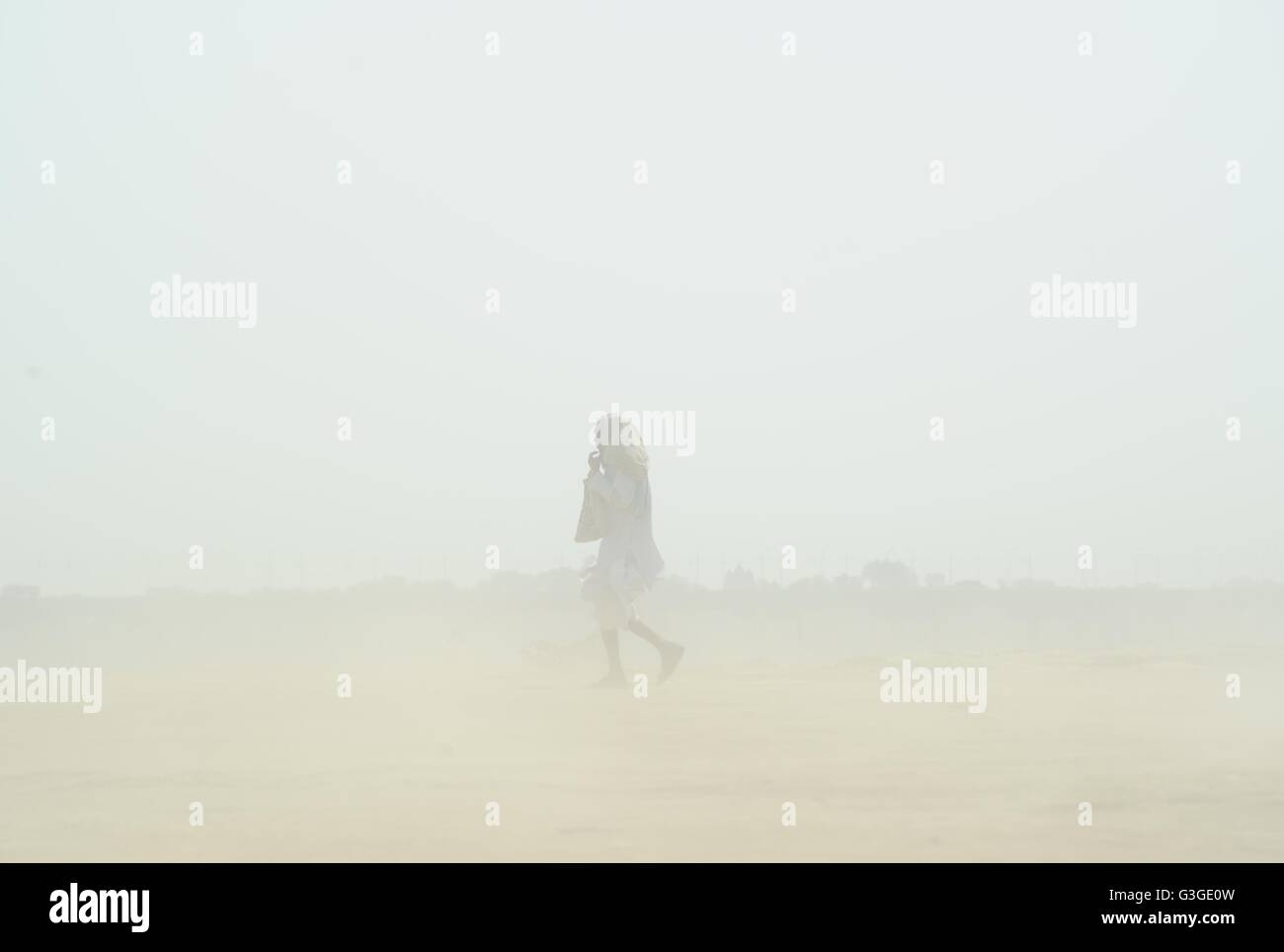 Allahabad, India. 21st May, 2016. A devotee cover himself by clothe as ...