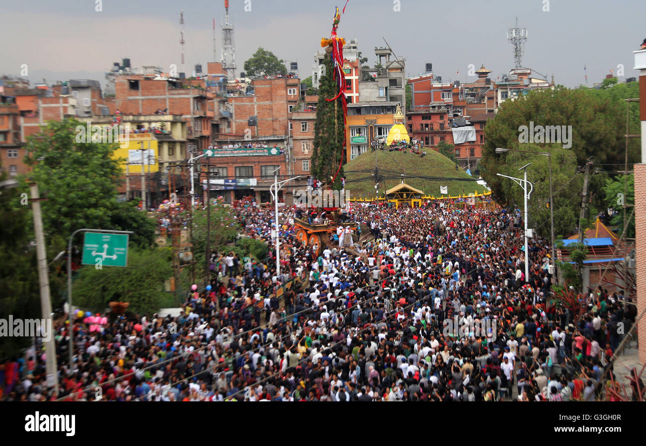 Devotees pull the chariot of Rato Machhendranath during the first day ...