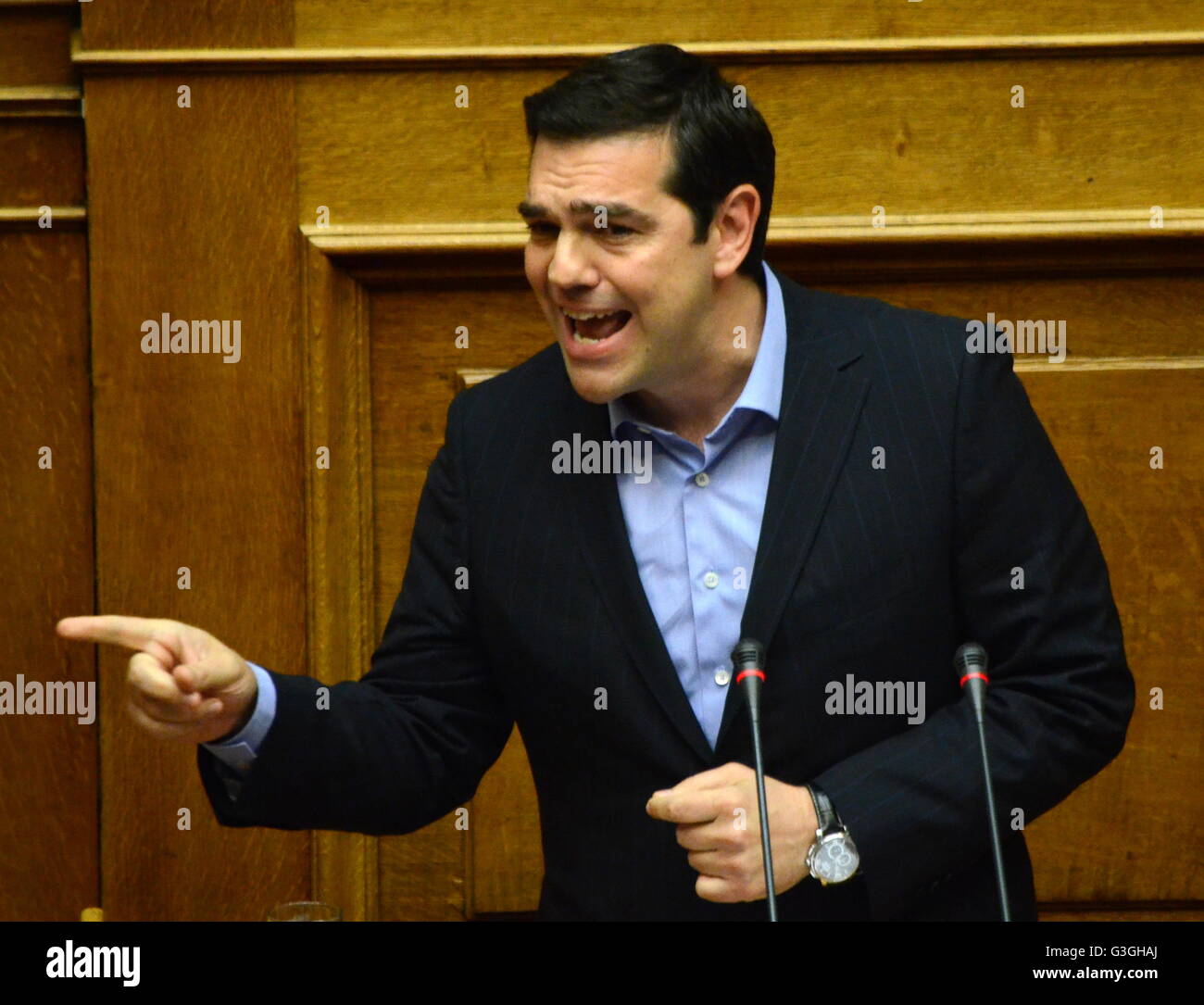 Greek Prime Minister Alexis Tsipras talks at the Greek Parliament ...