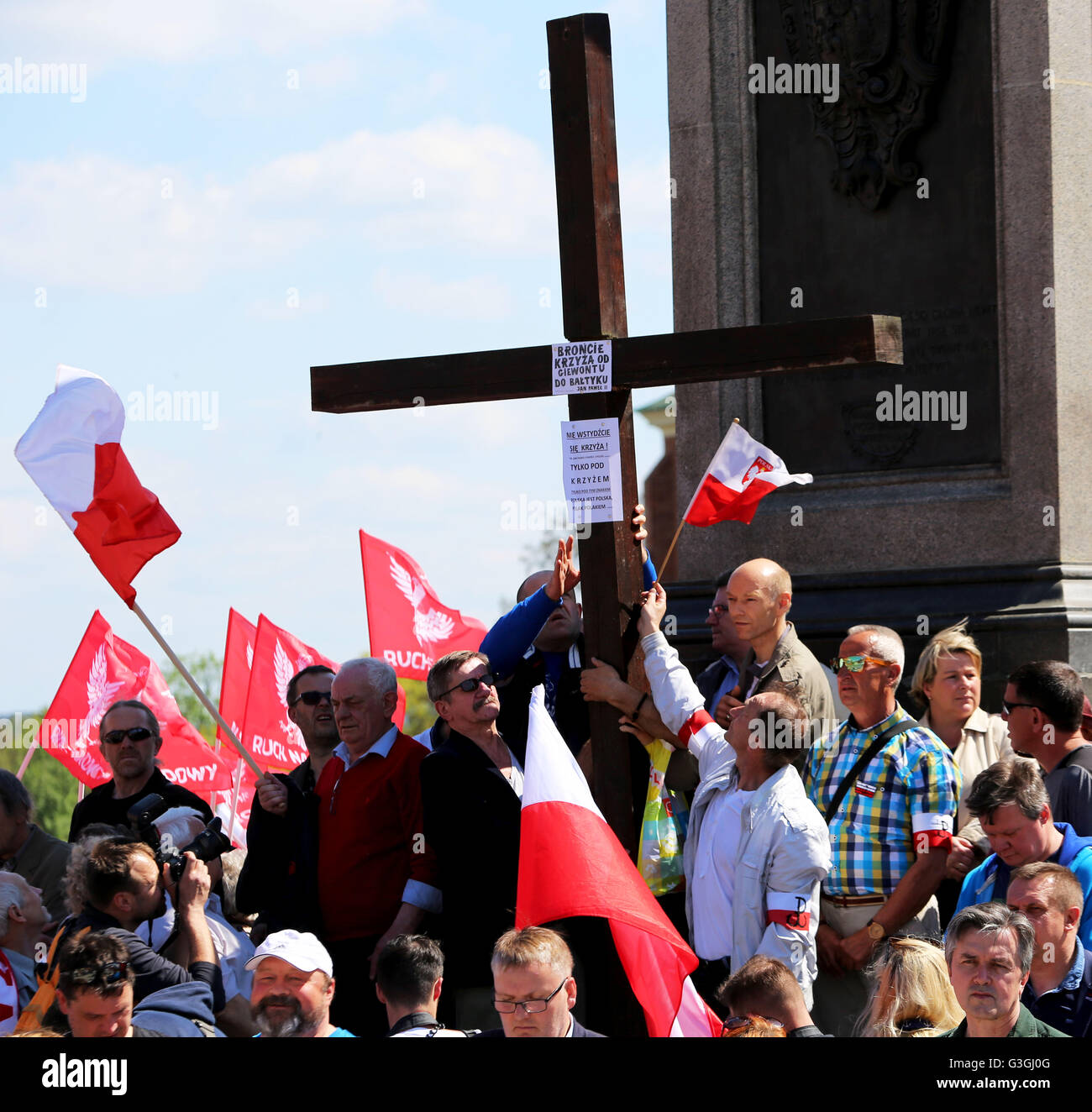 Around a thousand people gathered and marched in a protest in Warsaw ...