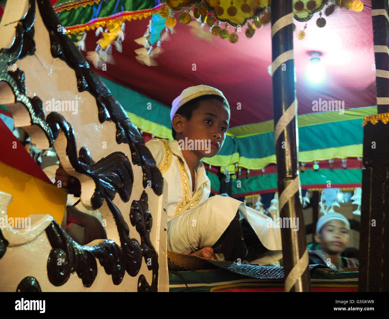 Pasay City, Philippines. 16th Apr, 2016. A young boy riding the float ...