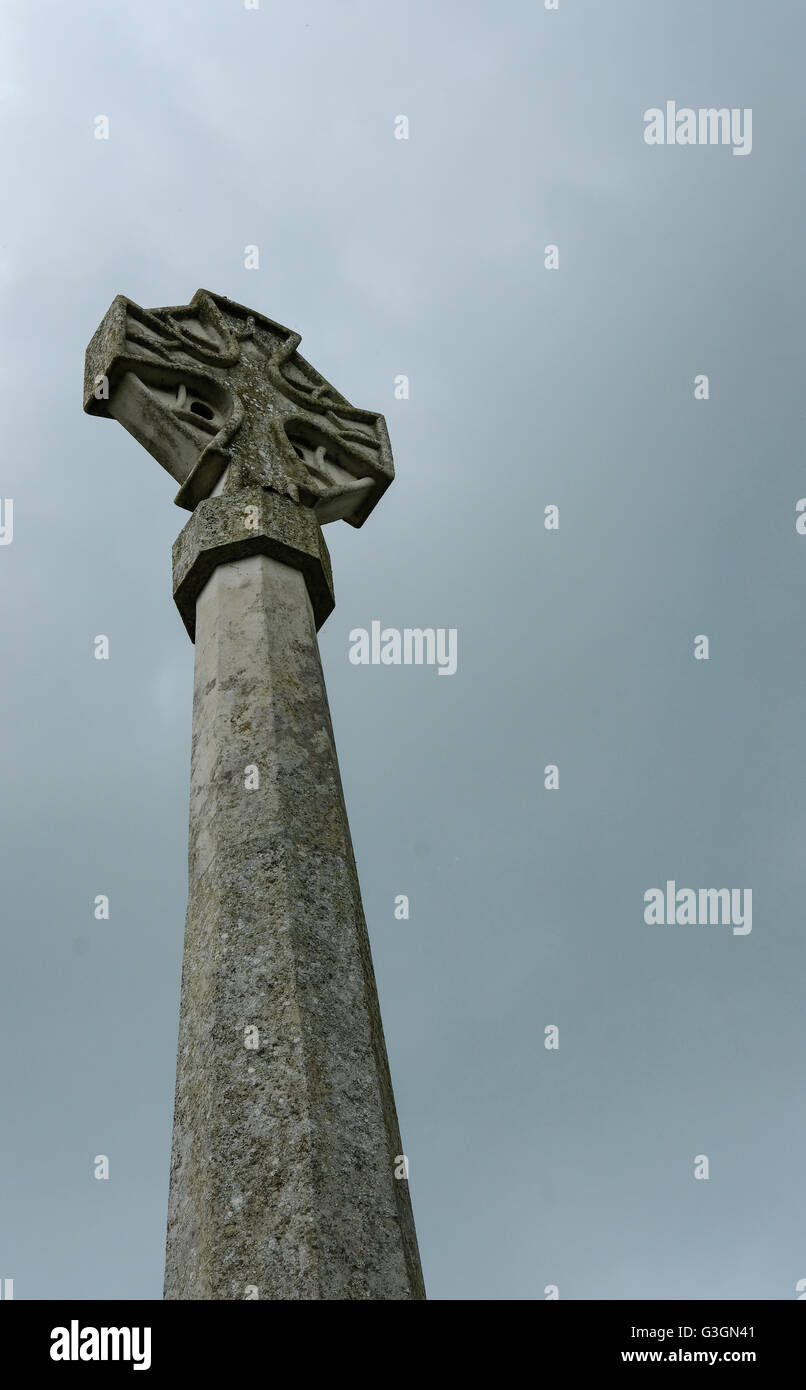 Tall, stonework monument seen at a cemetery Stock Photo - Alamy