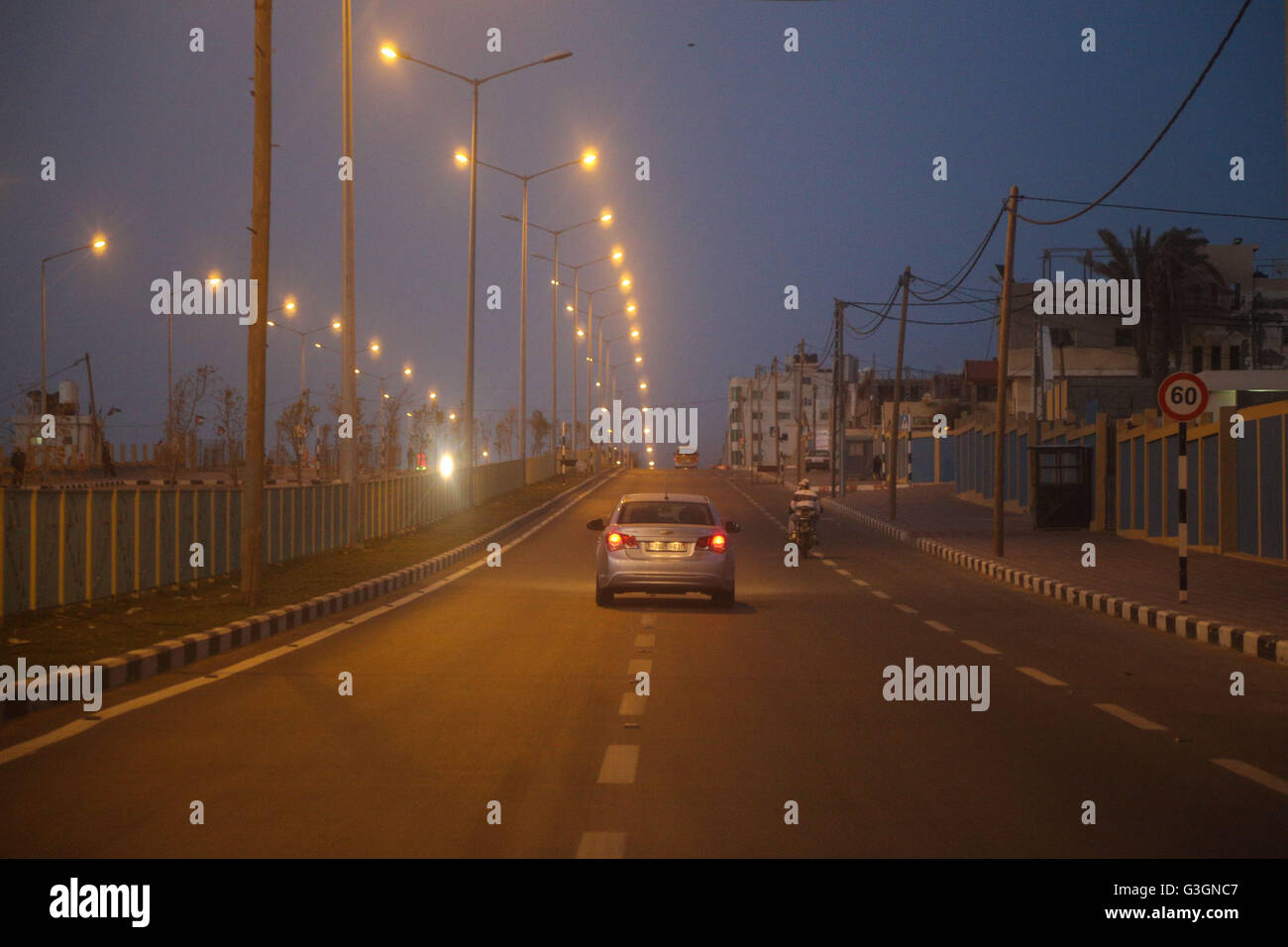 Gaza. 22nd Mar, 2016. A Palestinian drives his car at Al Rashid street ...