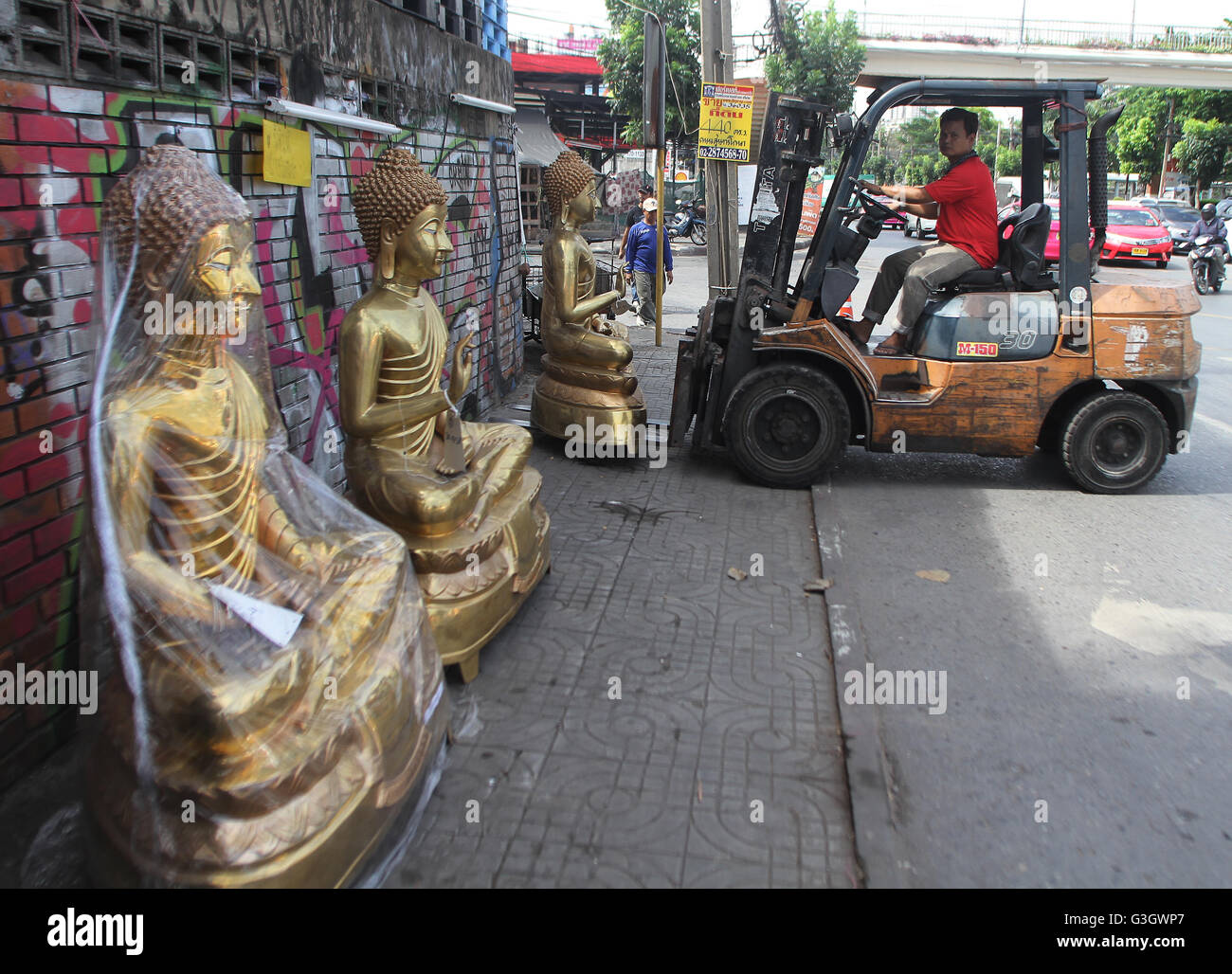 Bangkok, Thailand. 24th May, 2016. Buddha statues are ready to be ...