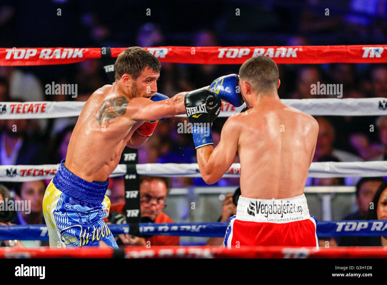 New York, USA. 11th June, 2016. Vasyl Lomachenko (L) of Ukraine punches ...