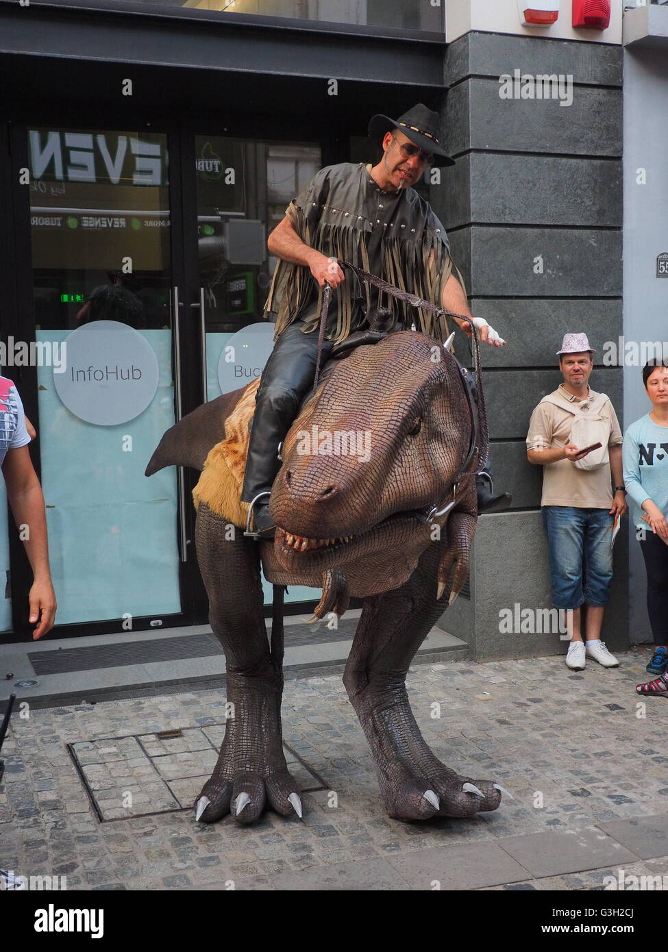 Ringo Starr Riding A Dinosaur