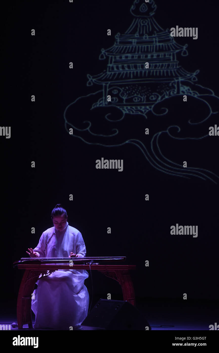 A musician plays the stringed instrument hi-res stock photography and ...