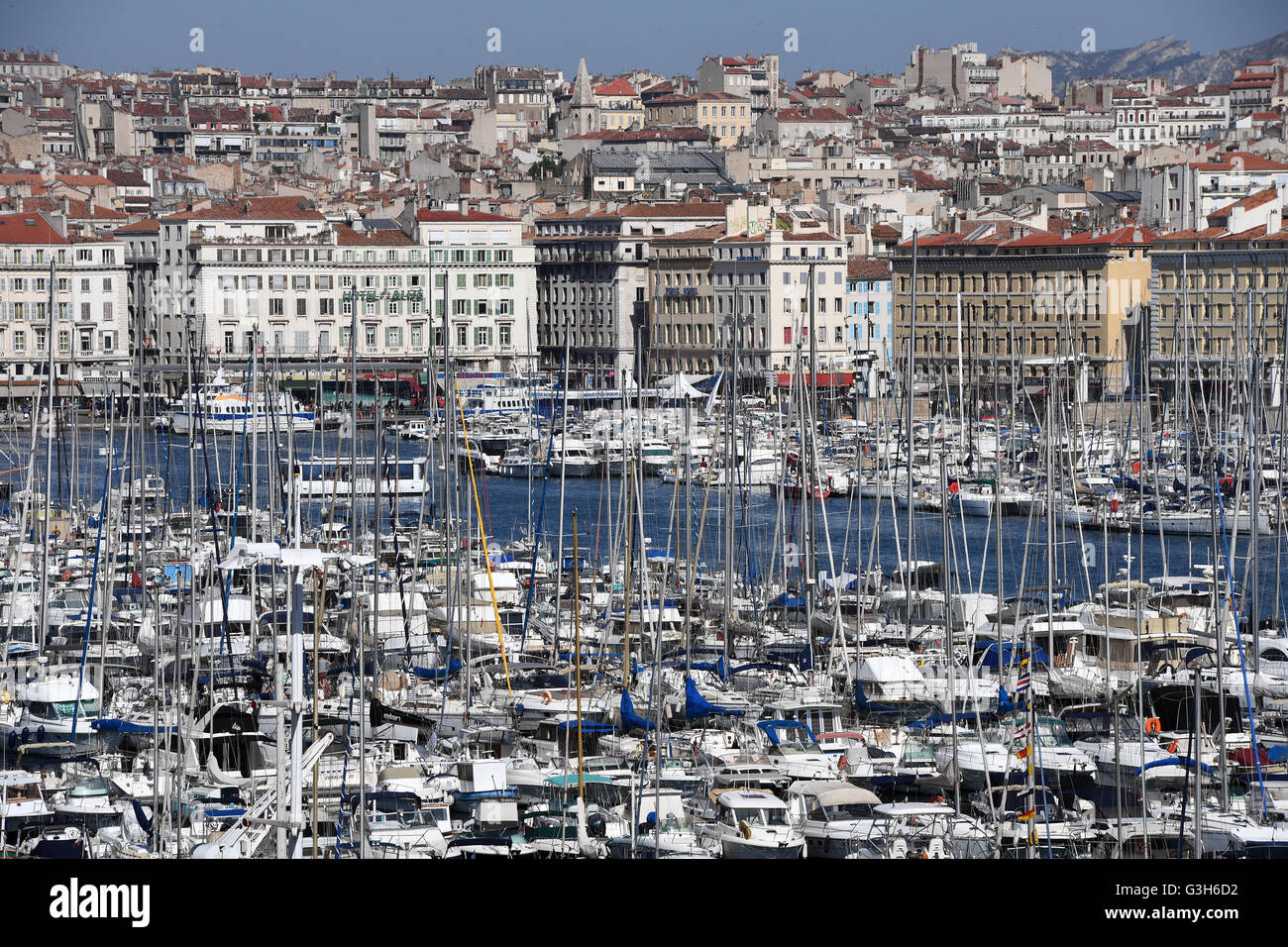 Plenty of boats and small ships are in the port of Marseille, France ...