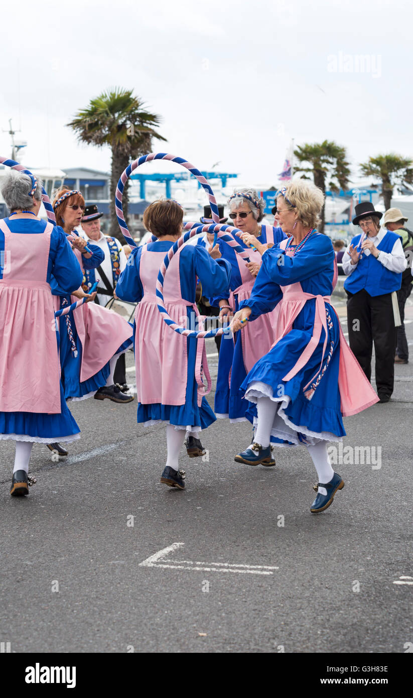 Poole, Dorset, UK. 25 June, 2016. The Quayside Cloggies perform and ...