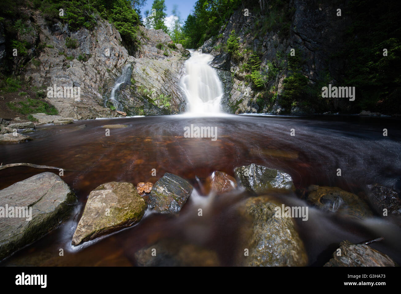 Long exposure view of a river with rocks. Nobody, landscape Stock Photo ...