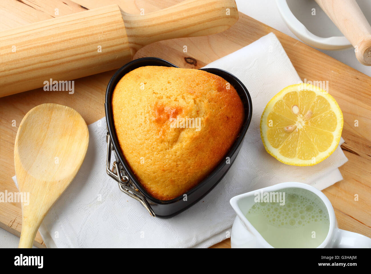 Heart shaped muffin with baking ingredients Stock Photo - Alamy