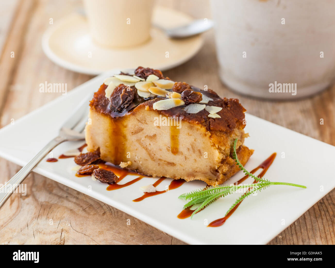 Homemade bread pudding on a rustic table Stock Photo - Alamy