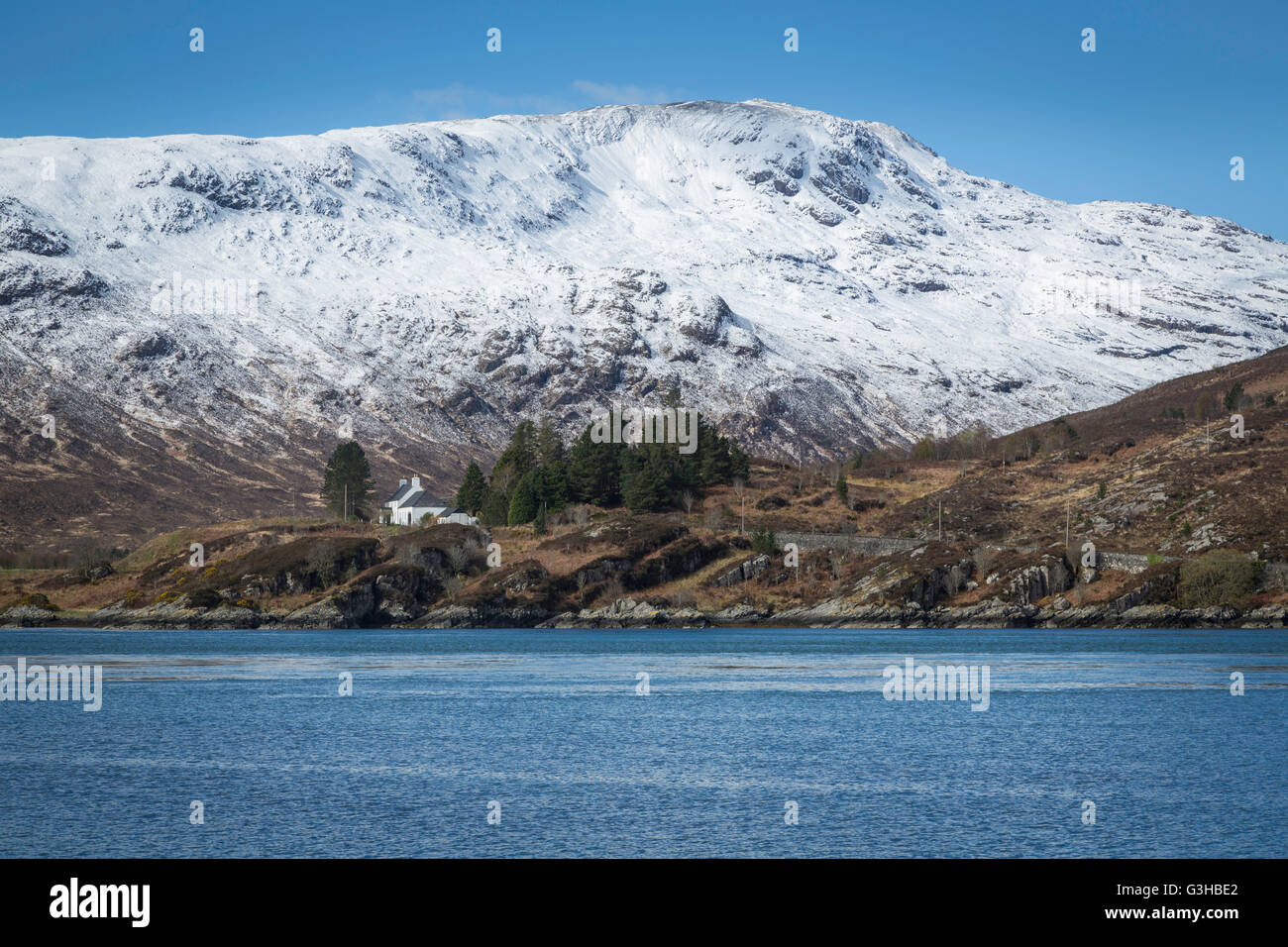 Tidal race at Kylerhea and snow covered hills of the Sleat peninsular ...