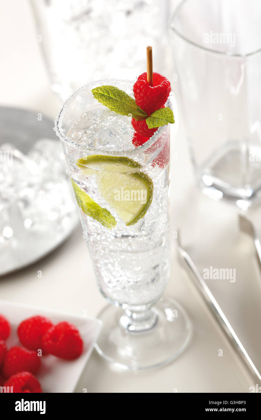 Raspberry mojito cocktail made with rum, ice, lime and raspberry ...