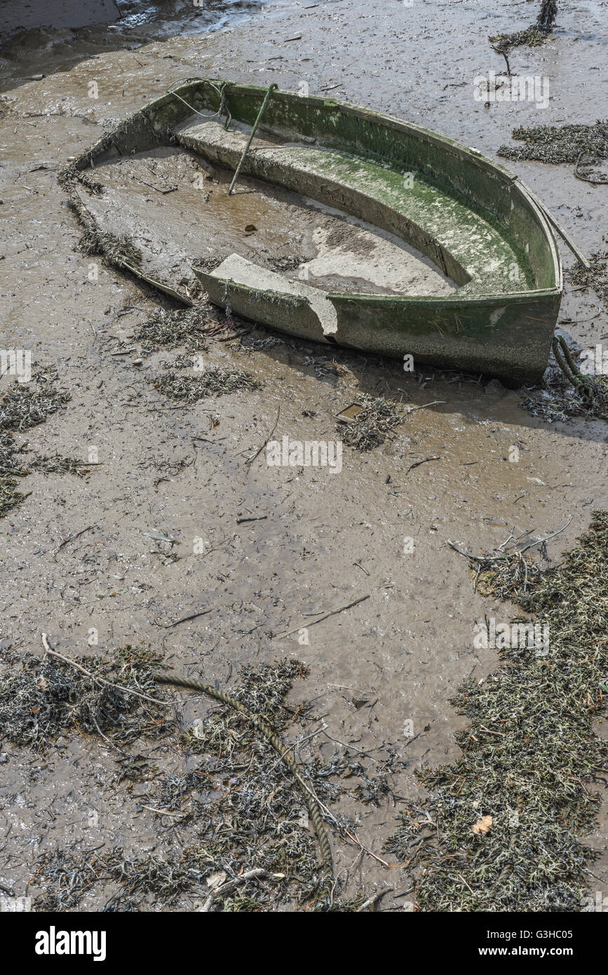 Sinking boat concept. Rowing boat as visual metaphor for washed up ...