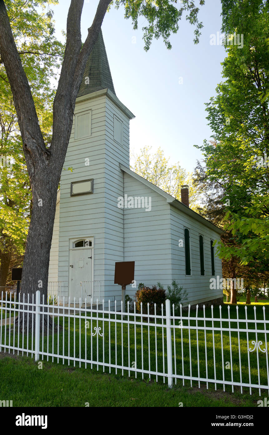 historic landmark church building behind white fence in inver grove ...
