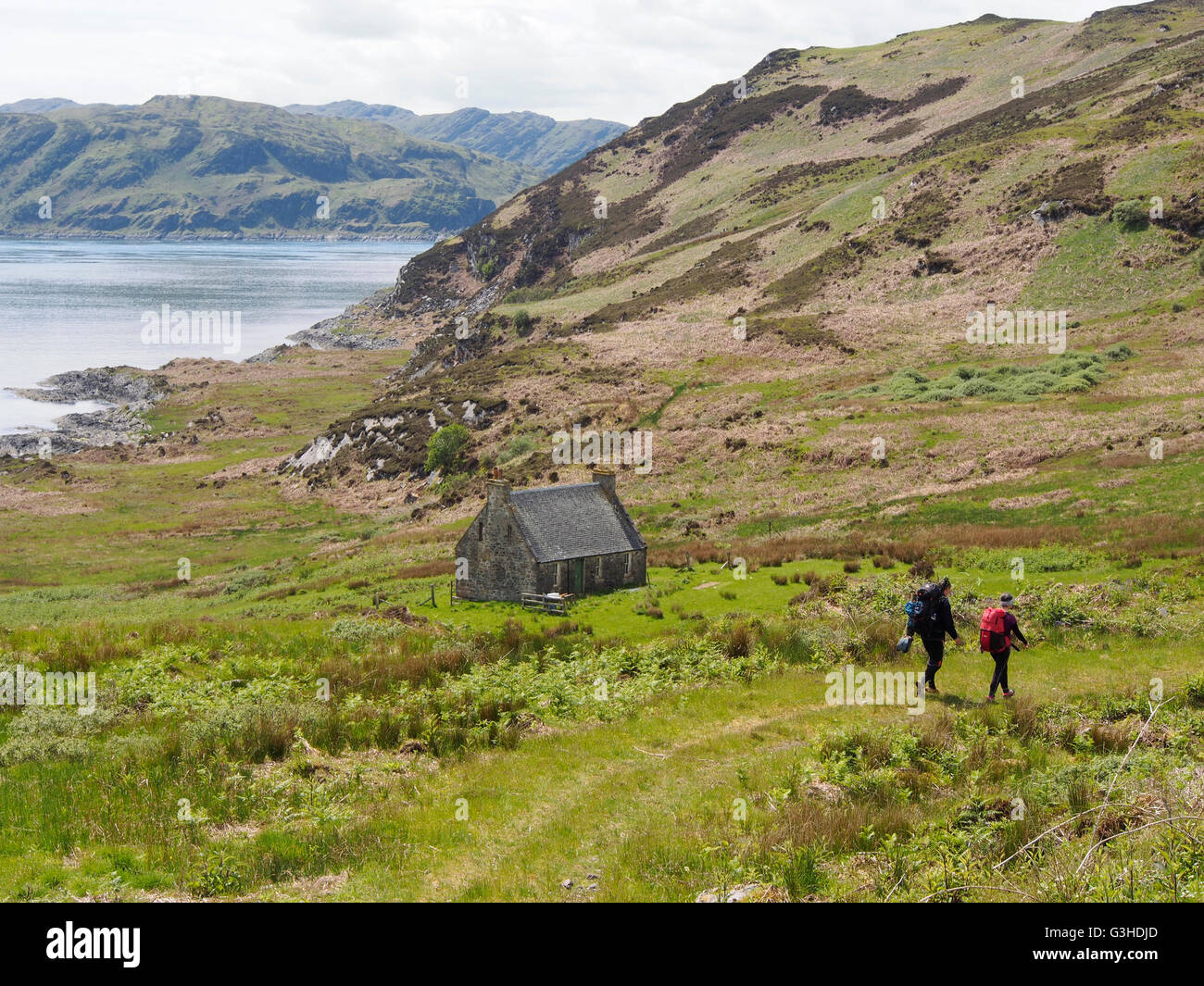 Approaching the bothy at the southern end of Scarba, Scotland Stock ...